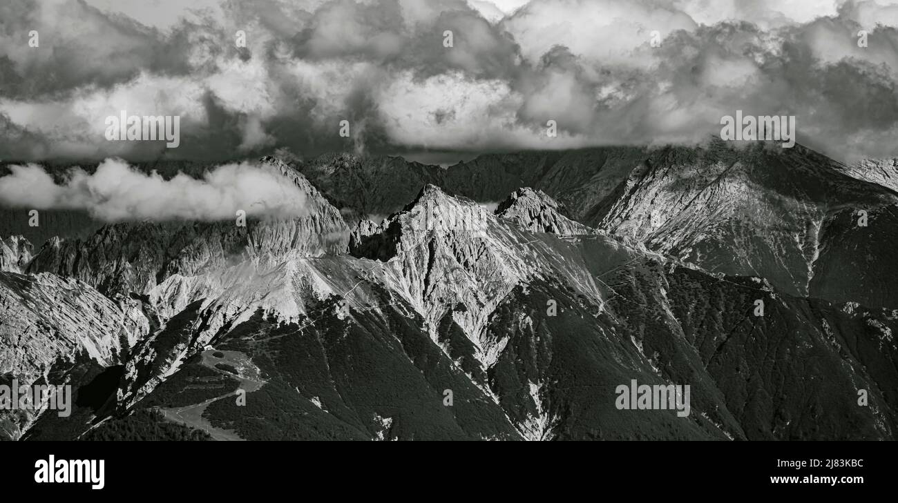 Rocky mountain ridge, cloudy peaks Oberreintalschrofen and ...