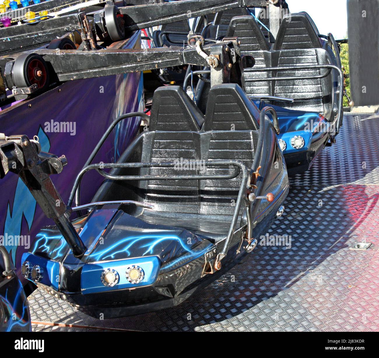Fairground thrill ride seats hi-res stock photography and images - Alamy