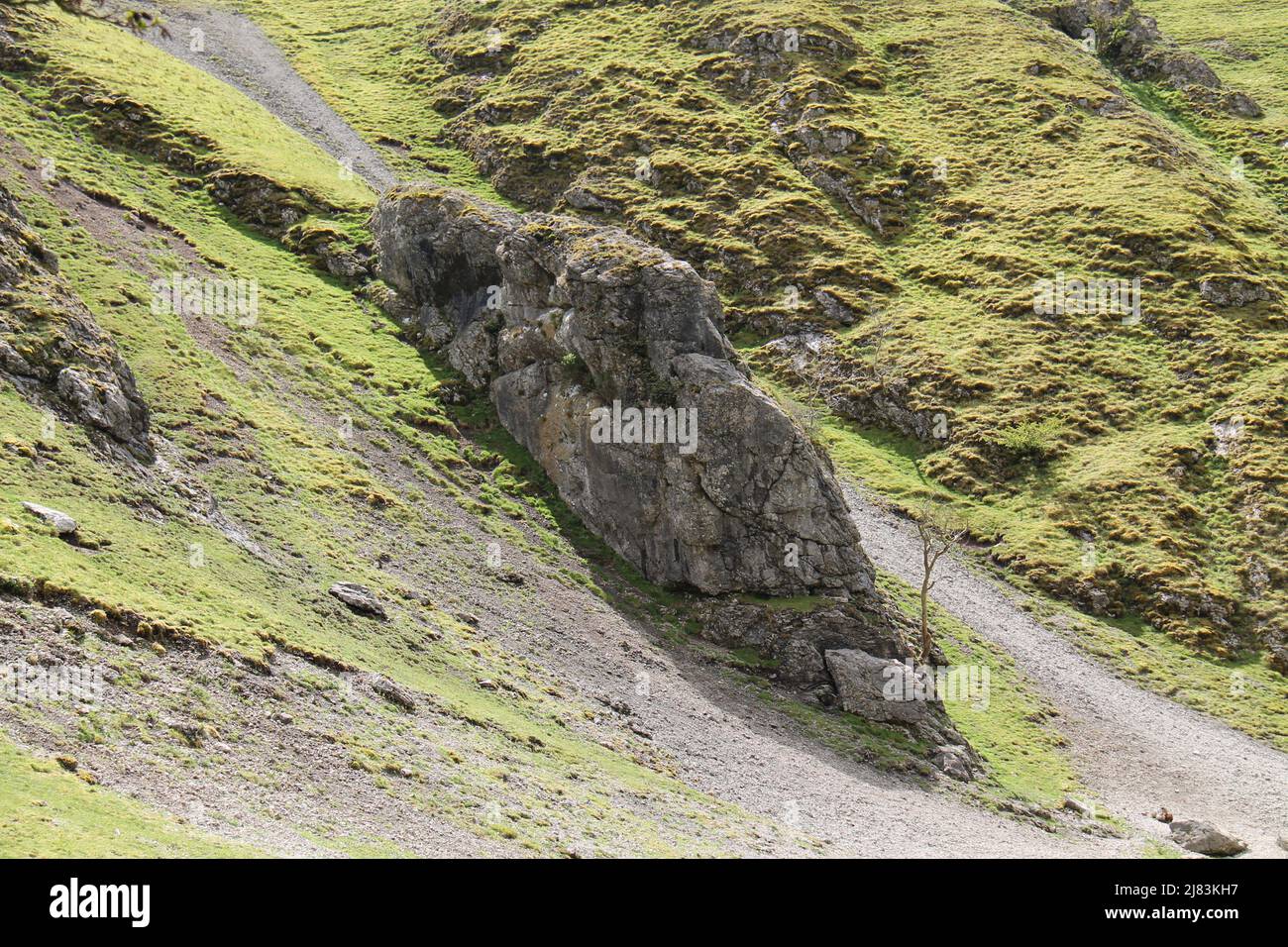 A Rocky Outcrop on a Steep Sided Mountain Hillside Stock Photo - Alamy