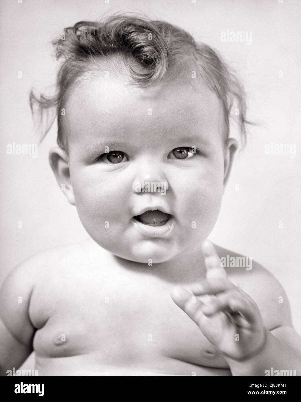 Baby 1940s thoughtful hi-res stock photography and images - Alamy
