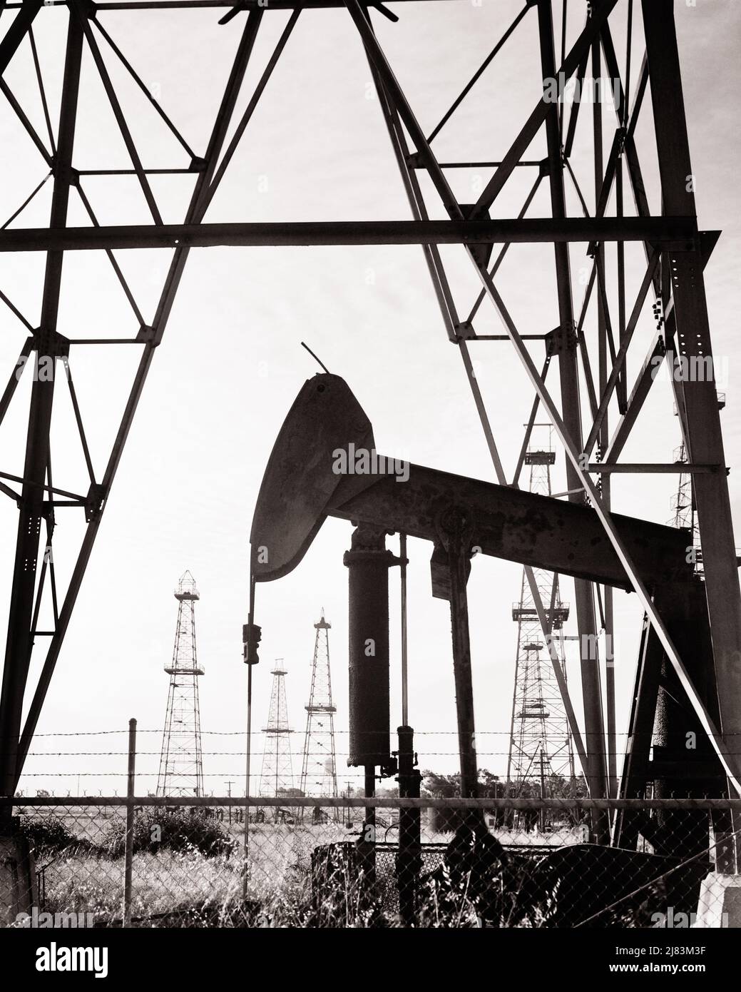 1970s SILHOUETTED OIL FIELD PUMPS RIGS AND DERRICKS SEAL BEACH ...