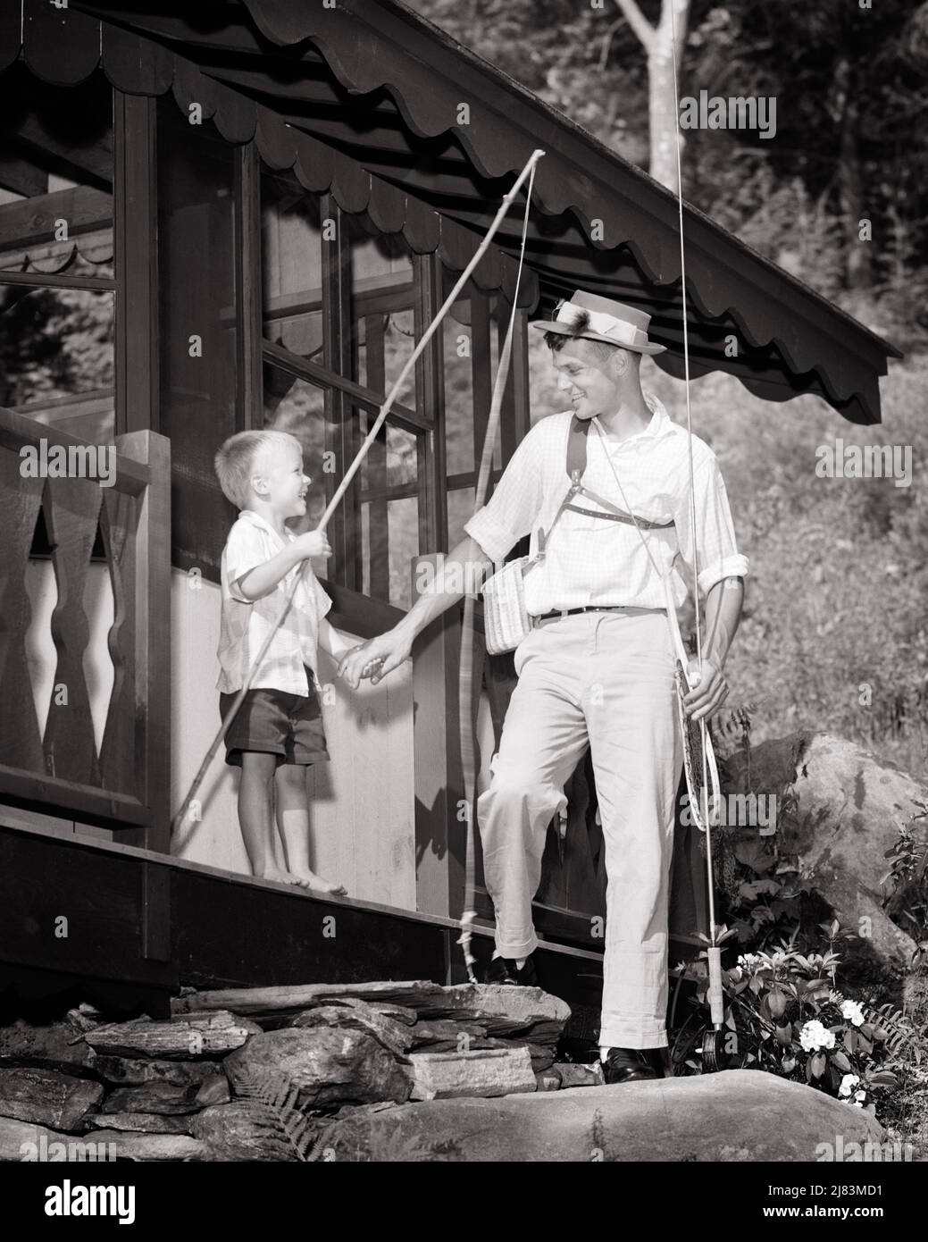 1950s father and son fishing hi-res stock photography and images - Alamy