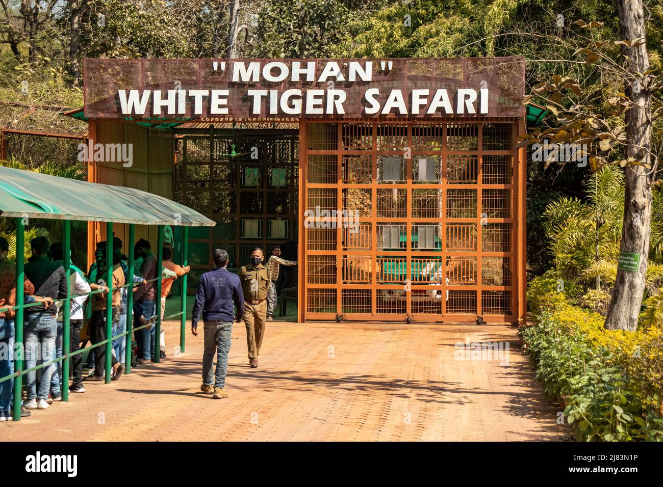 People standing in front of Mohan Tiger Safari main gate waiting to go ...