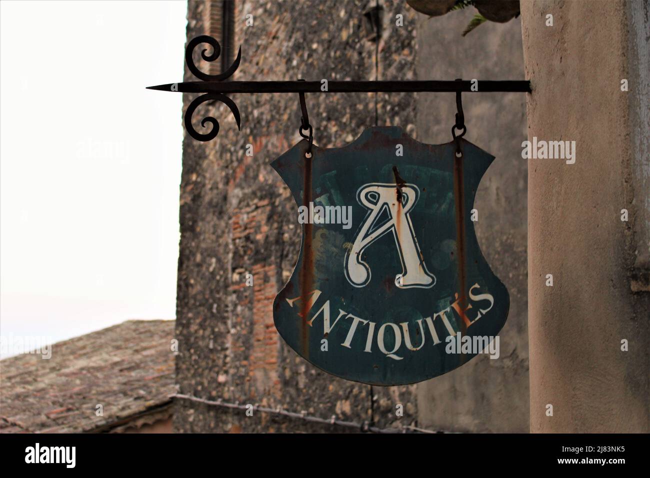 old antiques sign Stock Photo - Alamy