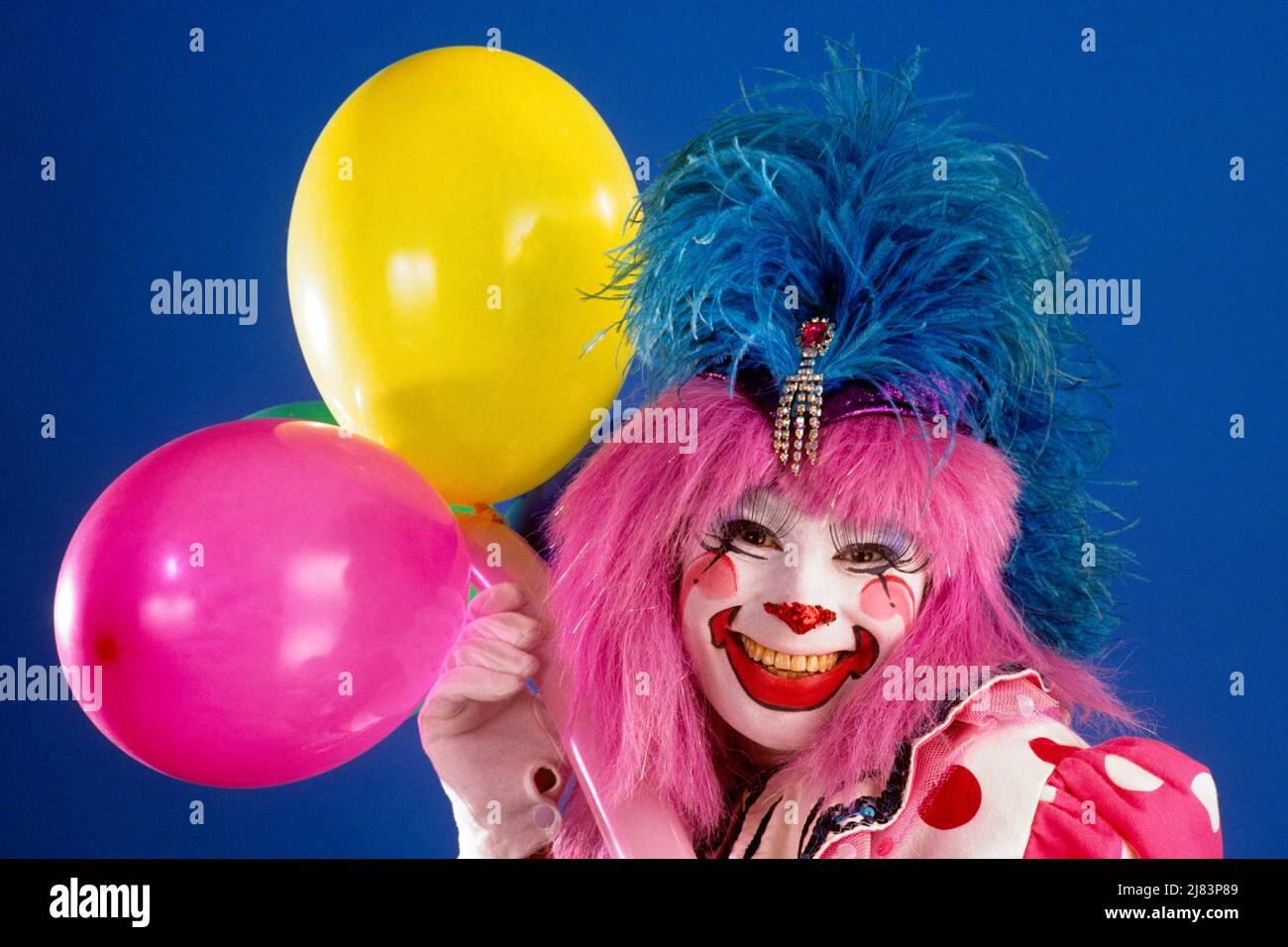 1990s SMILING LADY CLOWN WITH BALLOONS PAINTED FACE PINK HAIR BIG BLUE ...