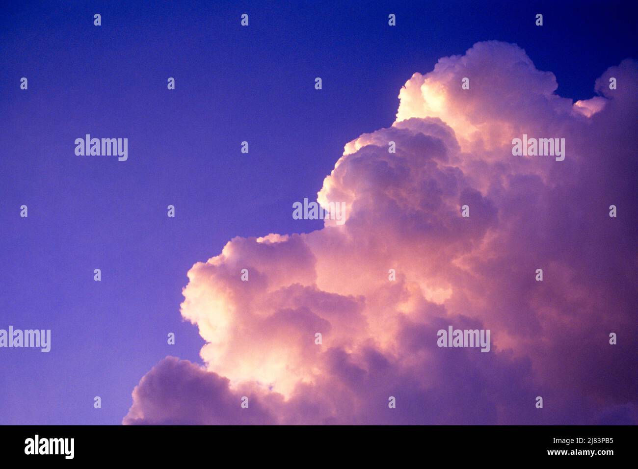 1990s THUNDERHEAD CUMULUS CLOUDS CATCHING INTERESTING SUNLIGHT ...