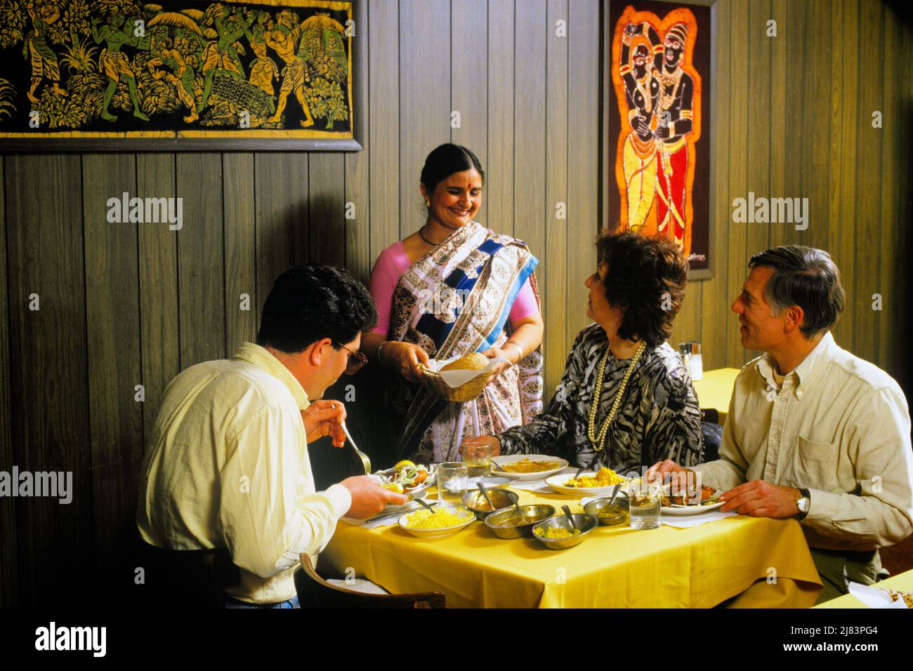 1980s HOSTESS AND DINERS AT INDIAN RESTAURANT PHILADELPHIA PENNSYLVANIA ...