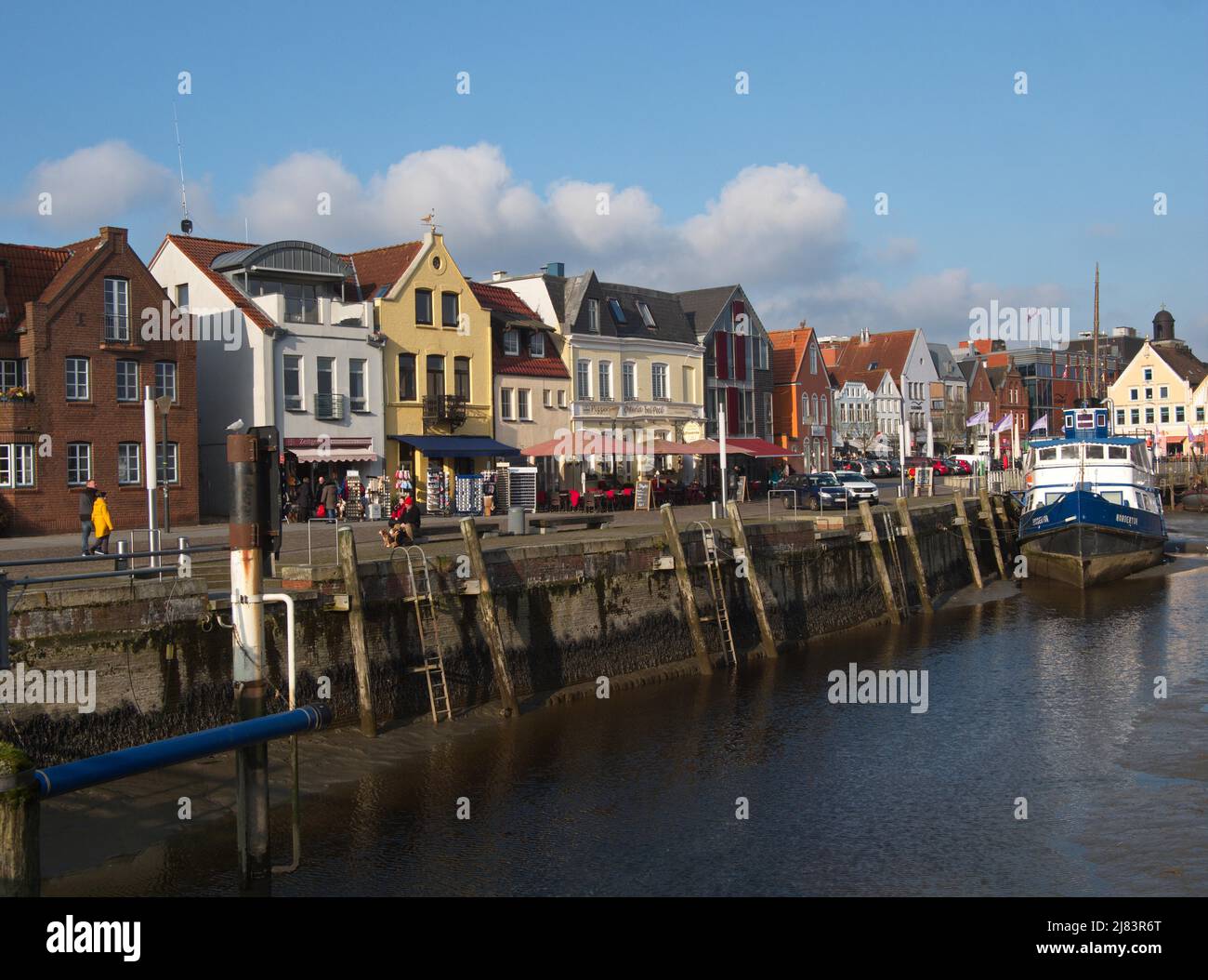 The inland harbour of Husum with colourful houses Stock Photo - Alamy