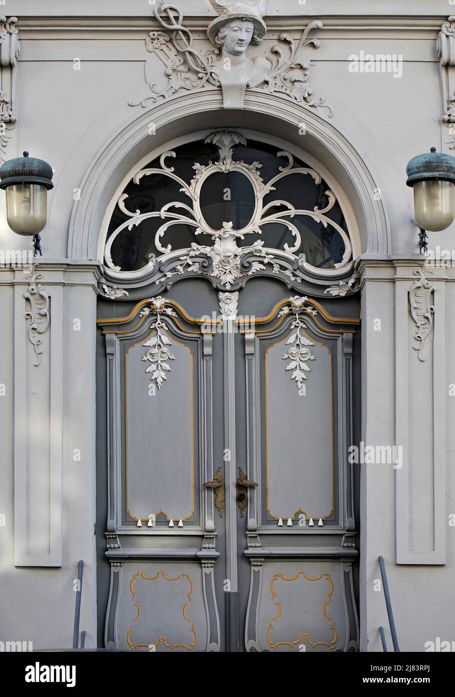 Beautiful entrance with decorative door to a house in the old town ...