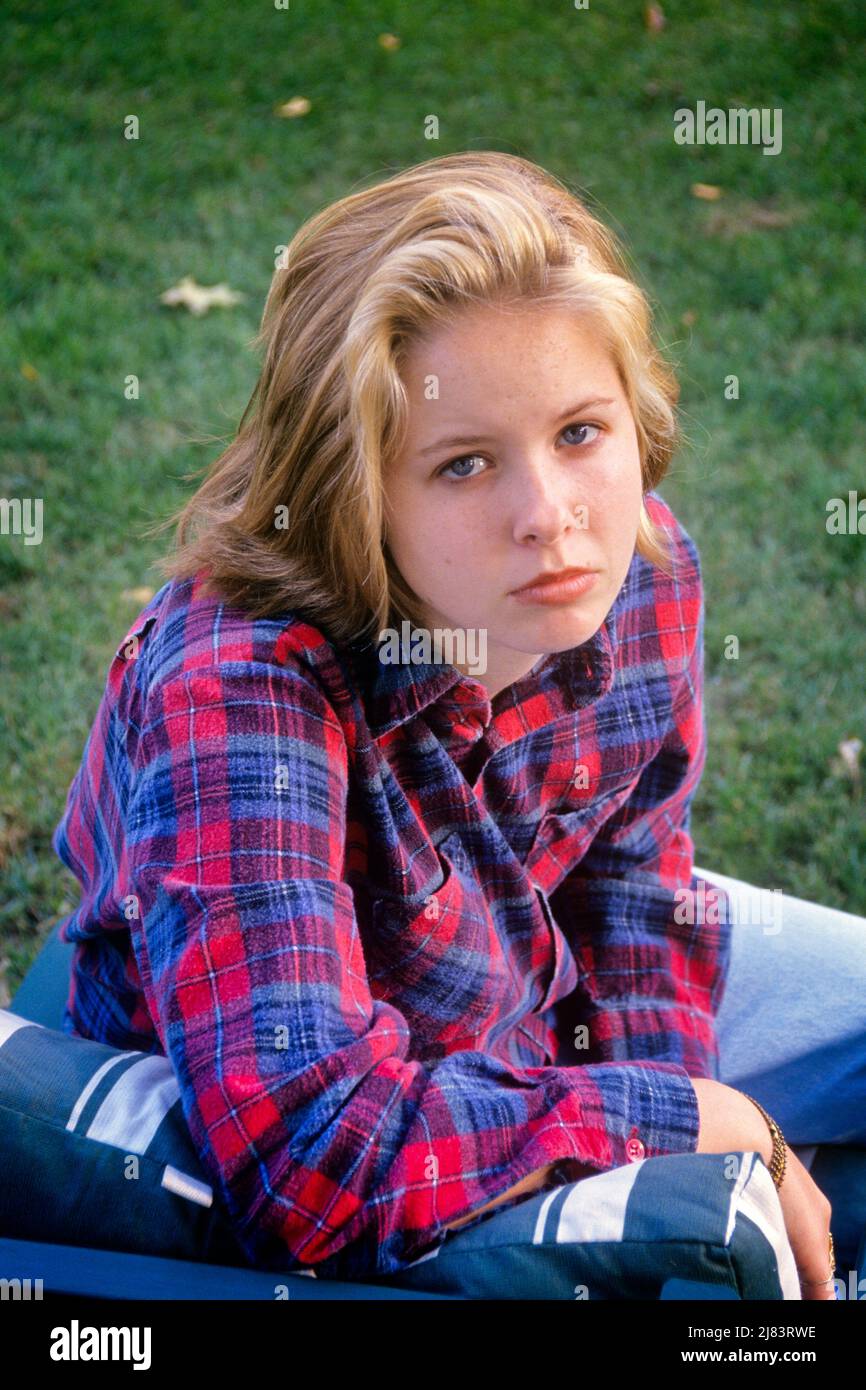 Girl with flannel shirt hi-res stock photography and images - Alamy