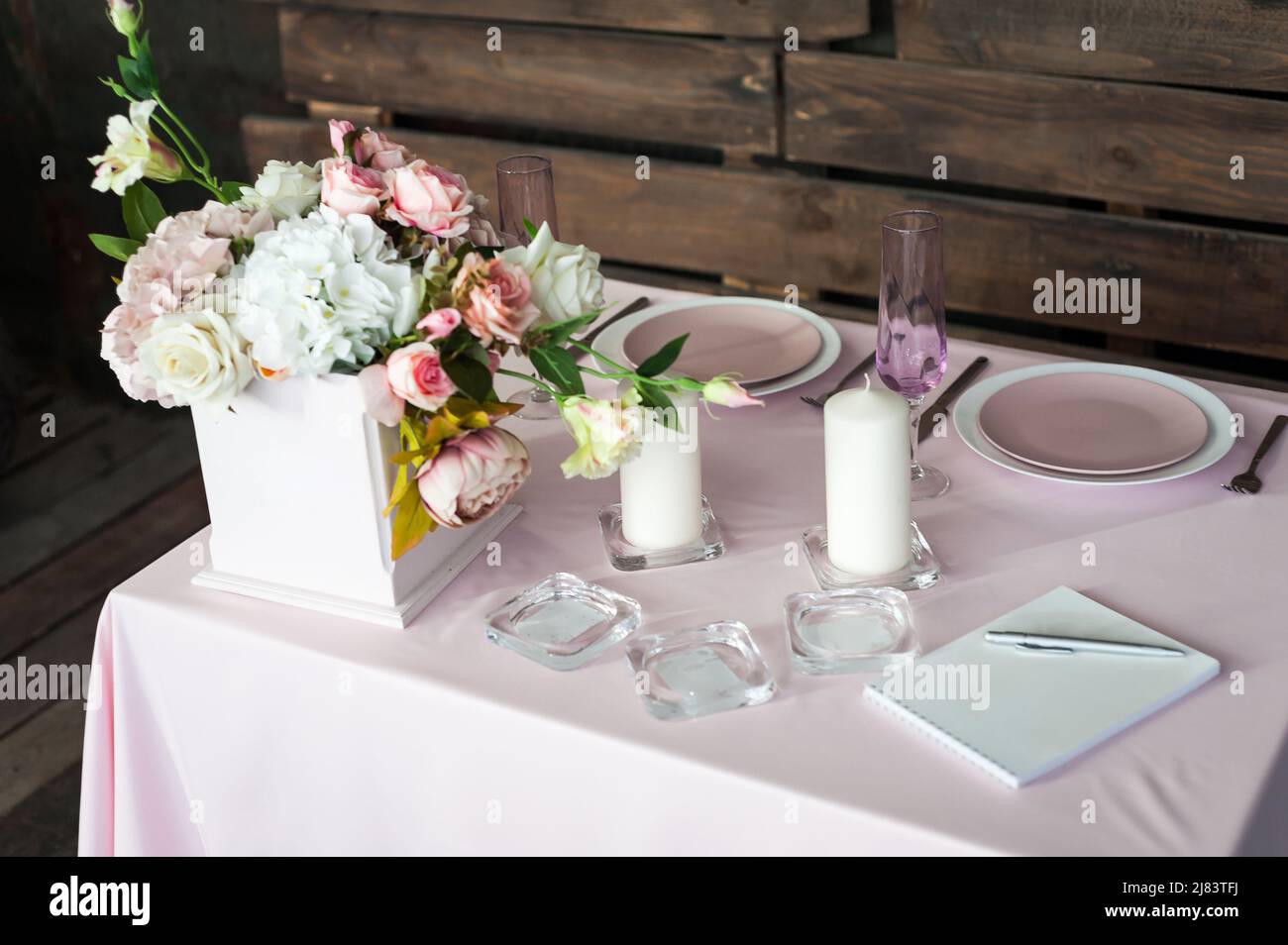 Setting the wedding table for a young couple Stock Photo - Alamy