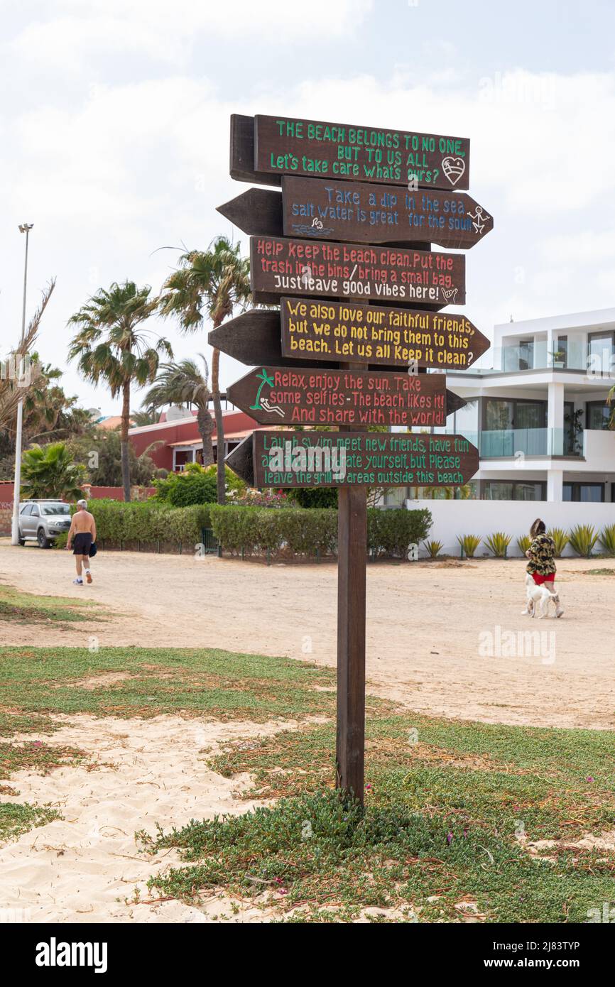 Colourful wooden signpost giving notice in a happy way, Santa Maria ...