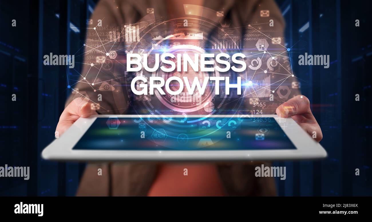 Person holding tablet, business concept Stock Photo - Alamy
