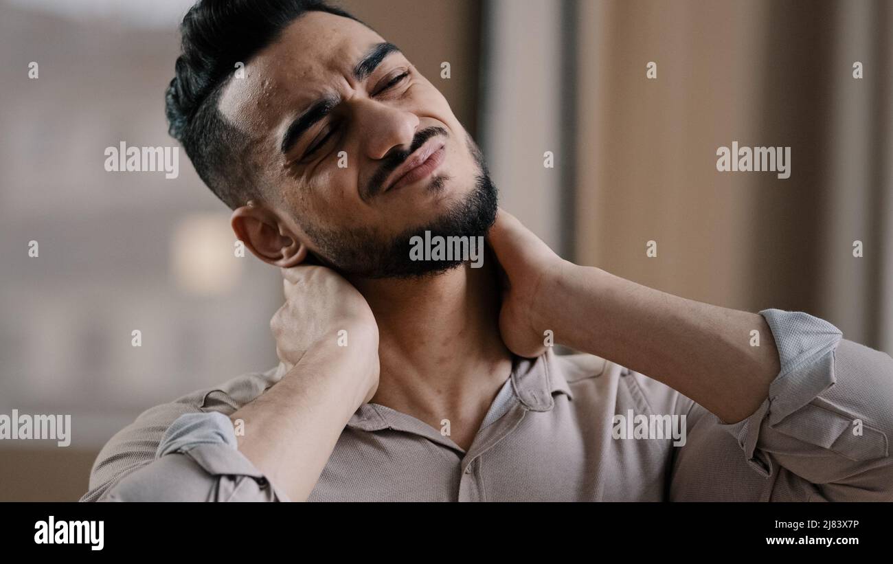 Tired hispanic exhausted man businessman employee suffering from ...