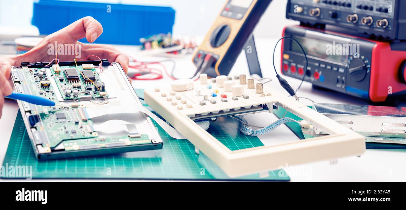 Repair of computer parts in a customer service laboratory Stock Photo ...
