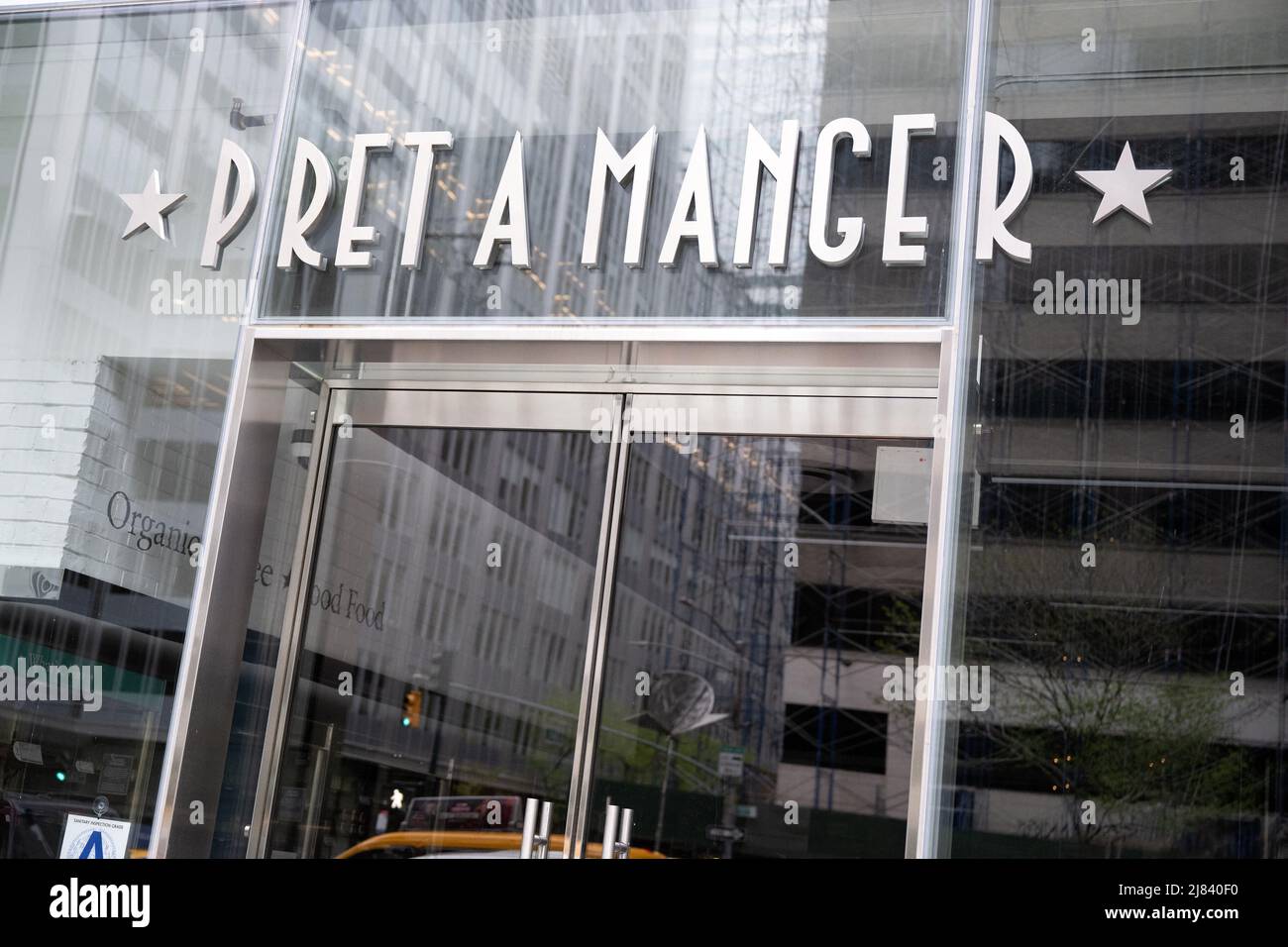 A shop sign of PRET A MANGER, on May 07, 2022 in New-York City, USA ...