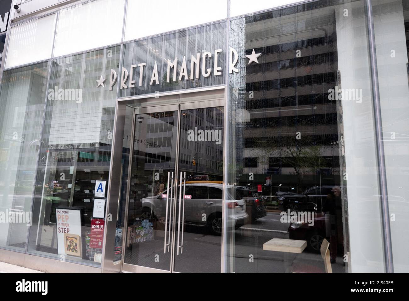 A shop sign of PRET A MANGER, on May 07, 2022 in New-York City, USA ...