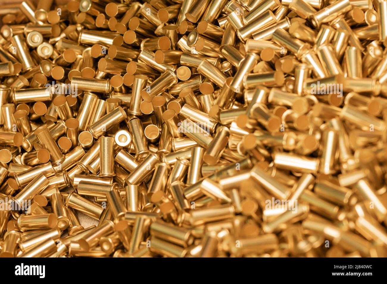 Pile of golden shells of bullets as background close view Stock Photo ...