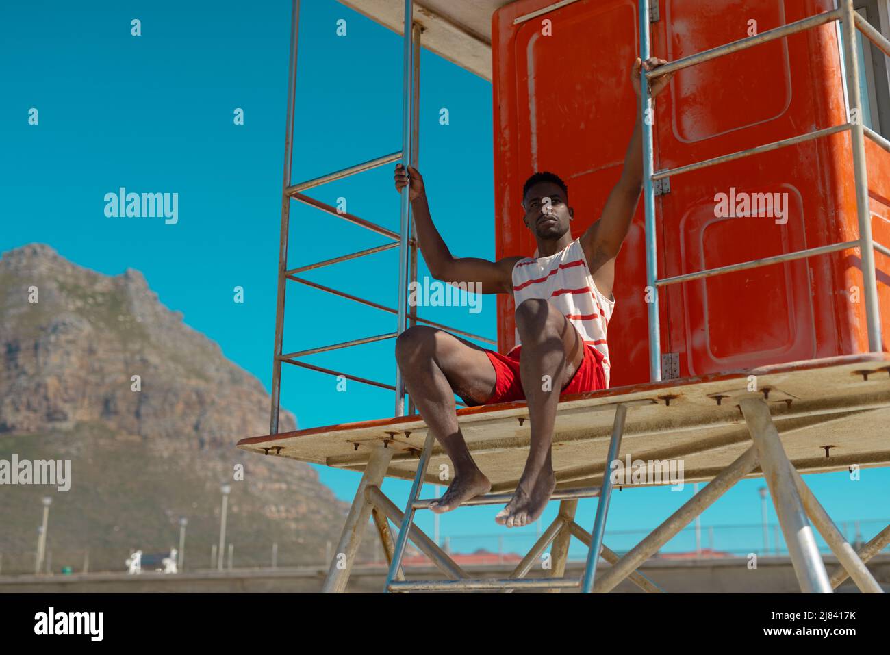 Sitting beach lifeguard hi-res stock photography and images - Alamy