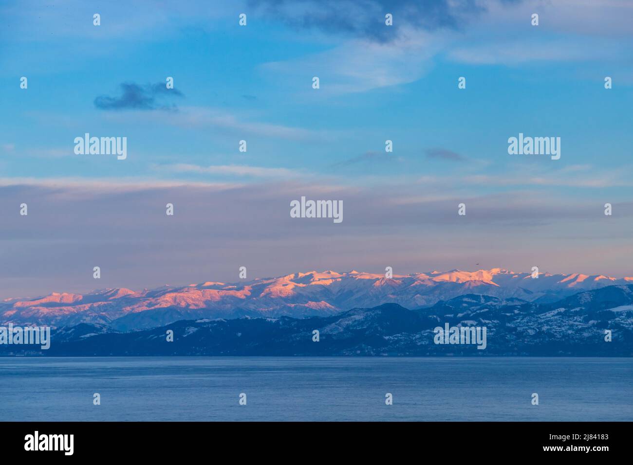Bay of Arakli, Trabzon, Turkey in the morning. Snowy mountain landscape ...