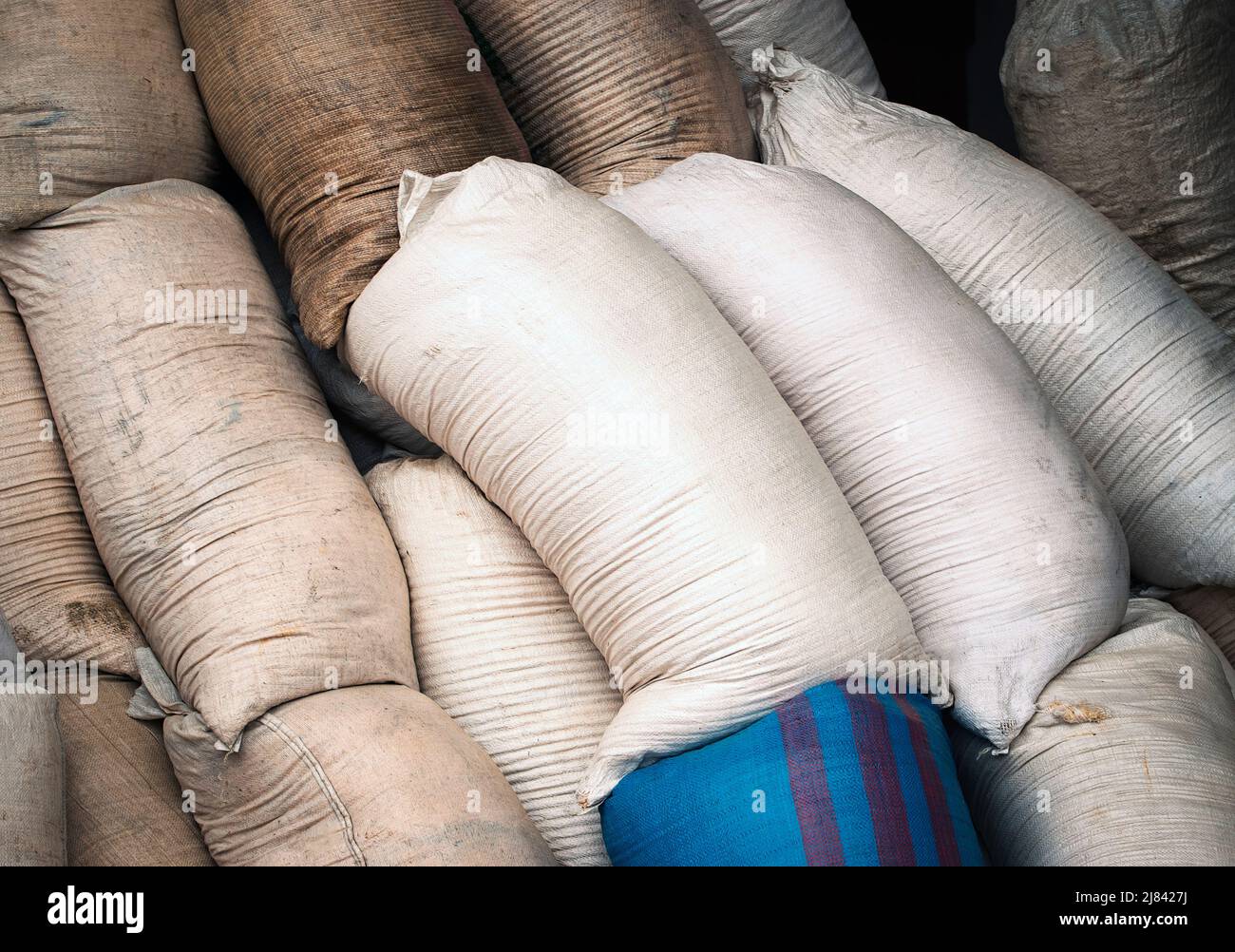 abstract background a group of old full bags Stock Photo - Alamy
