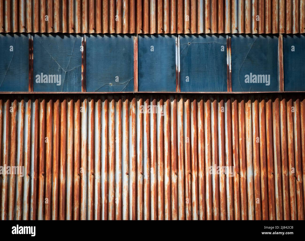 abstract background or texture a rusty metal gate with windows Stock ...
