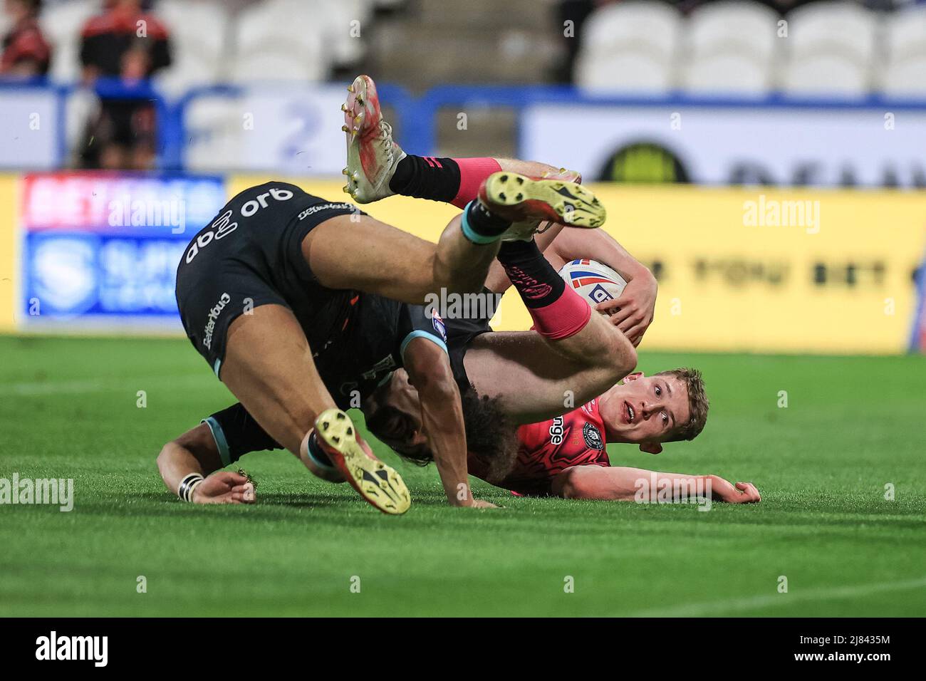 Matty Nicholson #30 of Wigan Warriors goes over for a try on his debut ...