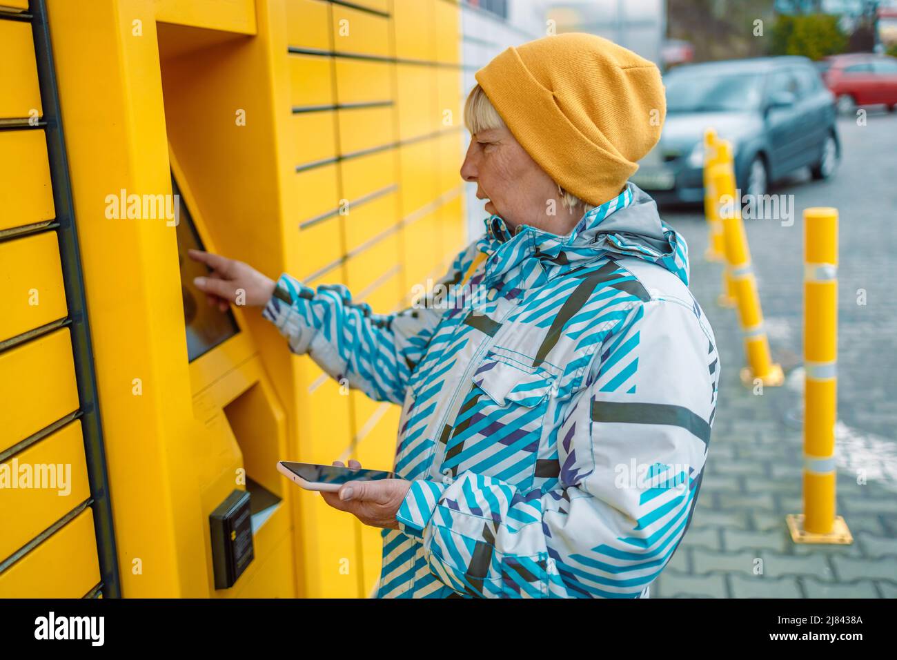 50s 60s Caucasian woman send or receive parcel with self service post ...