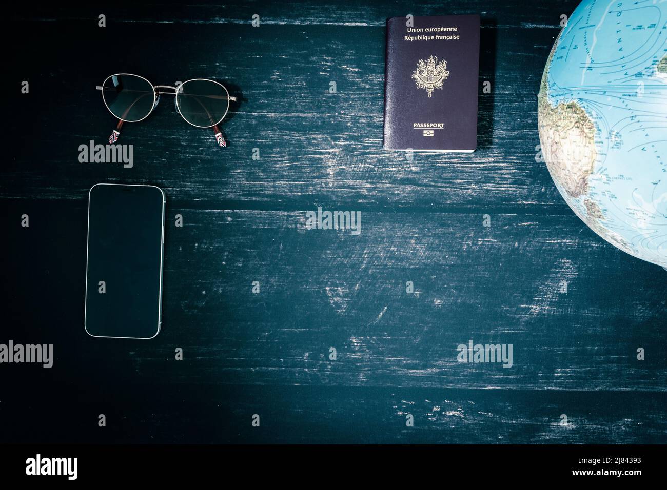 World map and items on wooden background, flat lay. summer travel ...