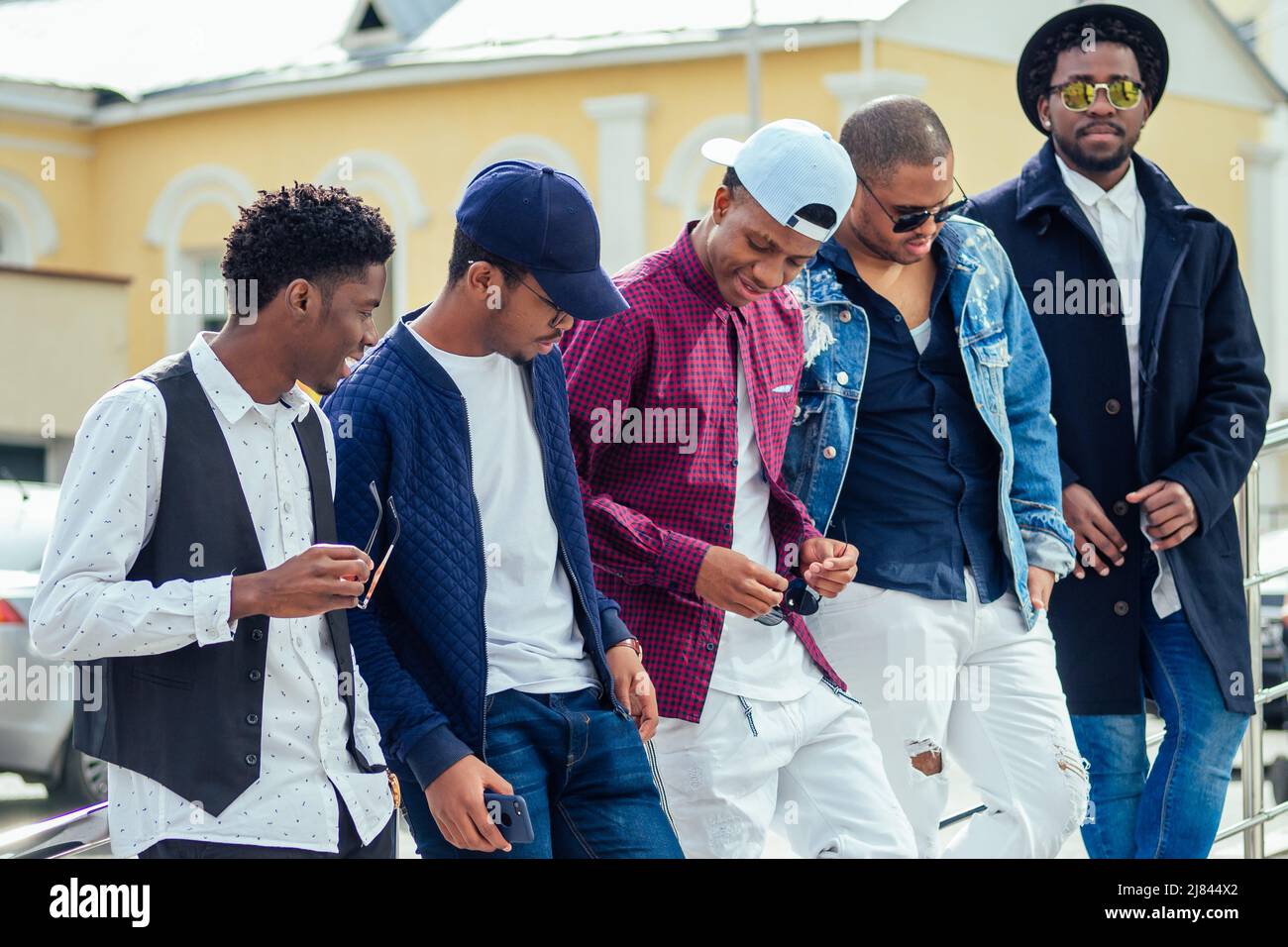 Group of many friends laughing out loud outdoor, sharing good and ...