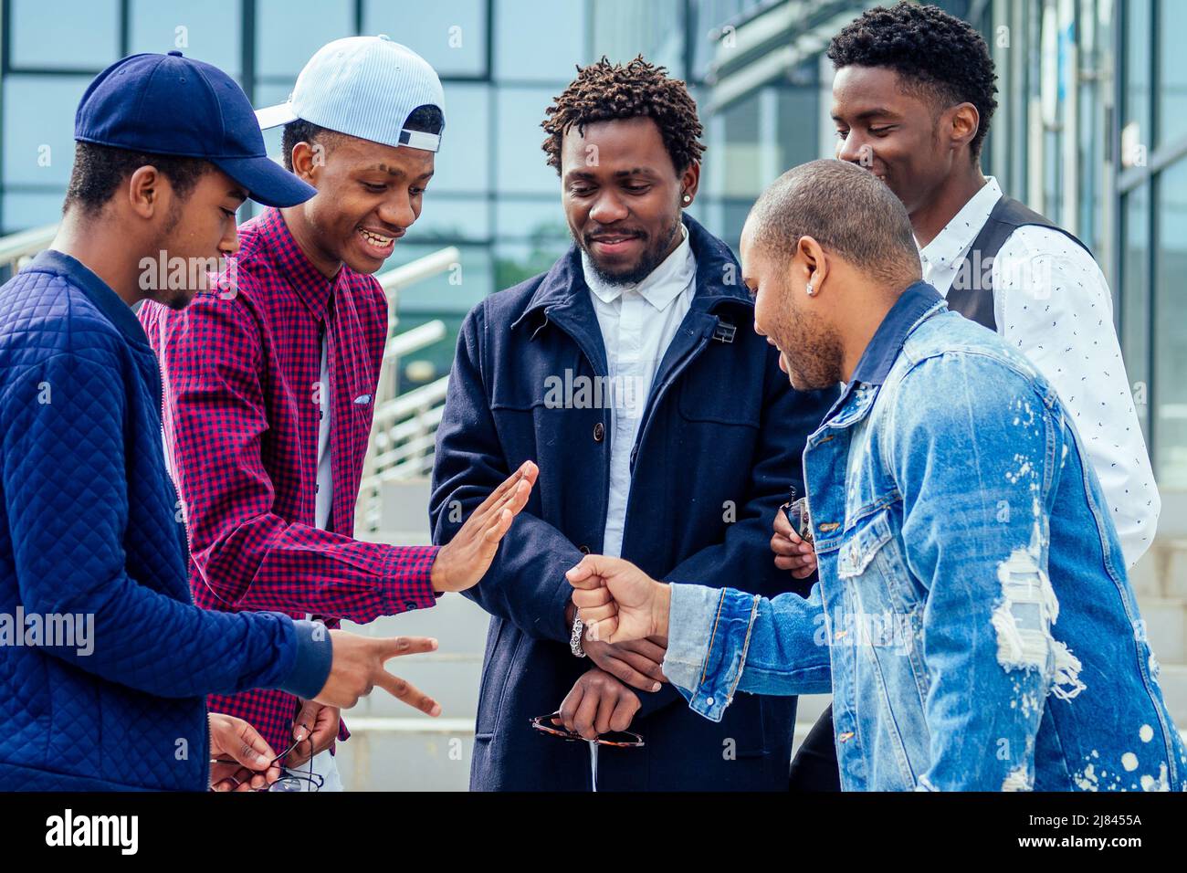 Group of many friends laughing out loud outdoor, sharing good and ...