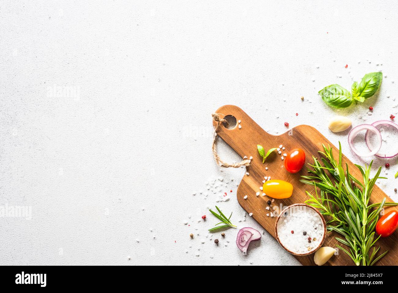 Food cooking background on white stone table Stock Photo - Alamy