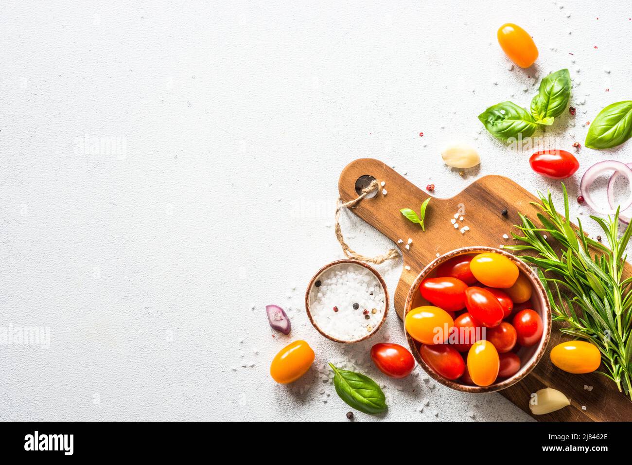 Food cooking background on white stone table Stock Photo - Alamy