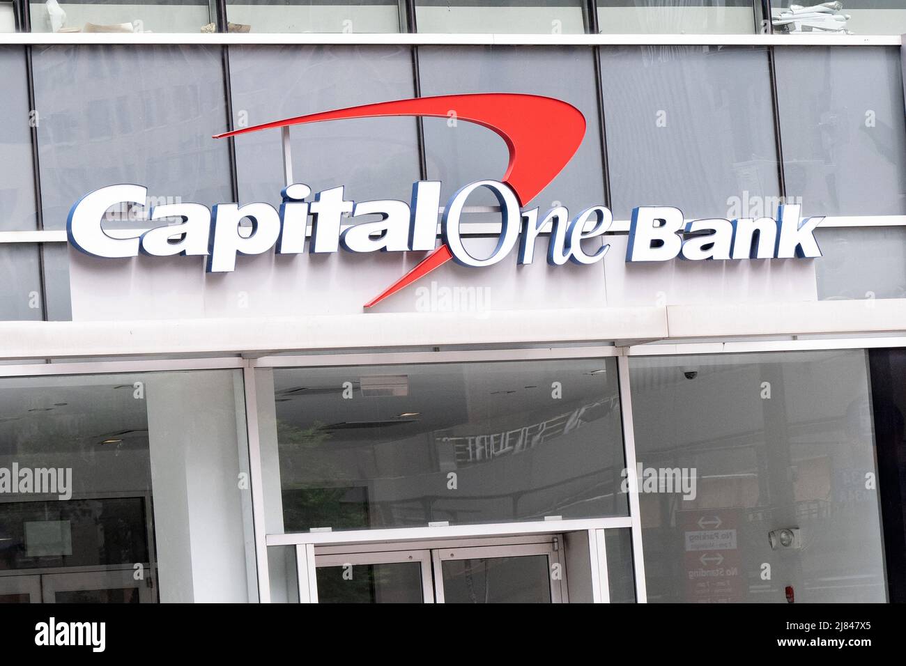 A shop sign of Capital One Bank, on May 07, 2022 in New-York City, USA ...