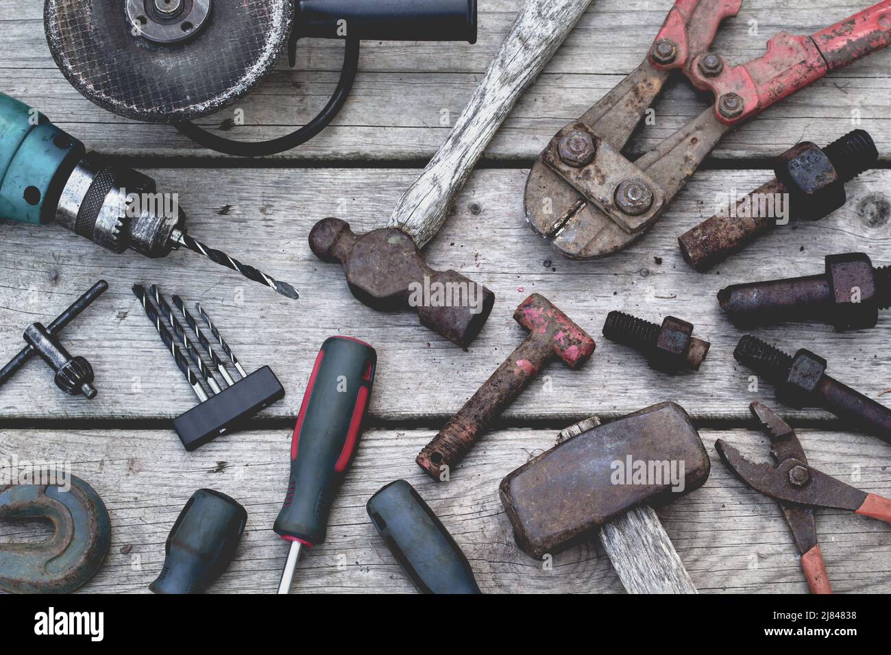 Collection of old work tools with desaturated look Stock Photo - Alamy