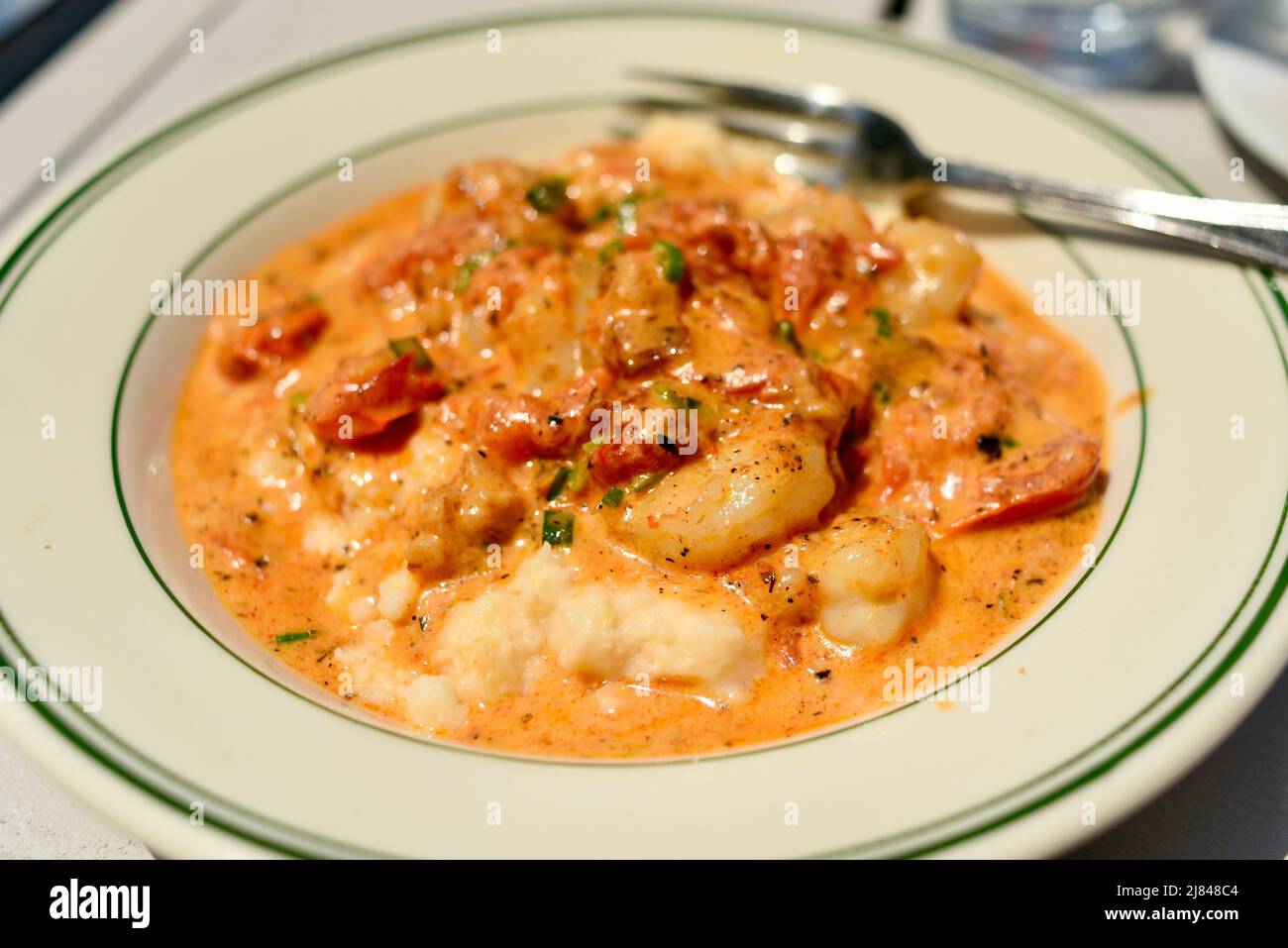 Gulf shrimp and cheddar grits with garlic, chardonnay wine cream sauce ...