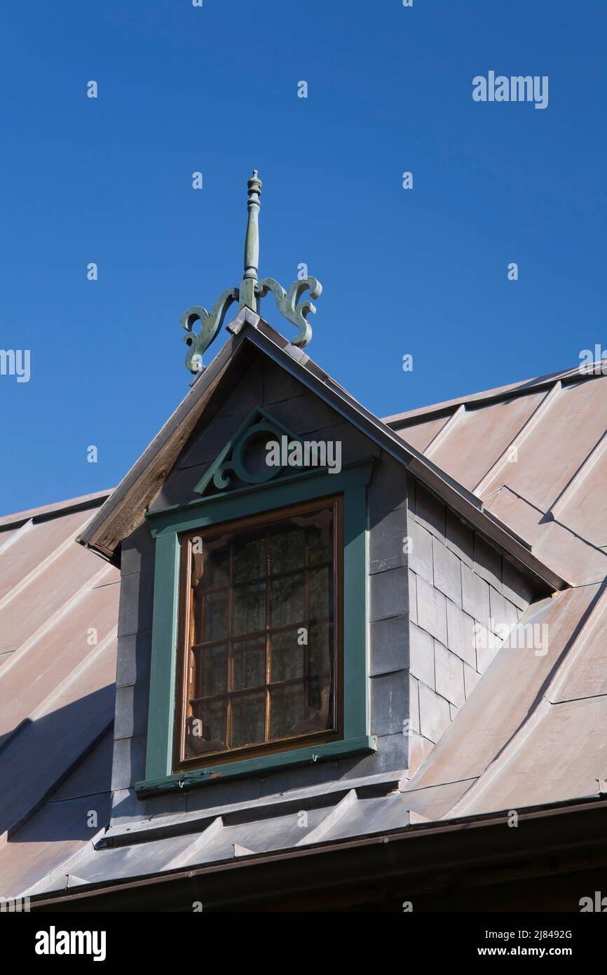 Close-up of dormer window on old reconstructed 1800s Canadiana cottage ...