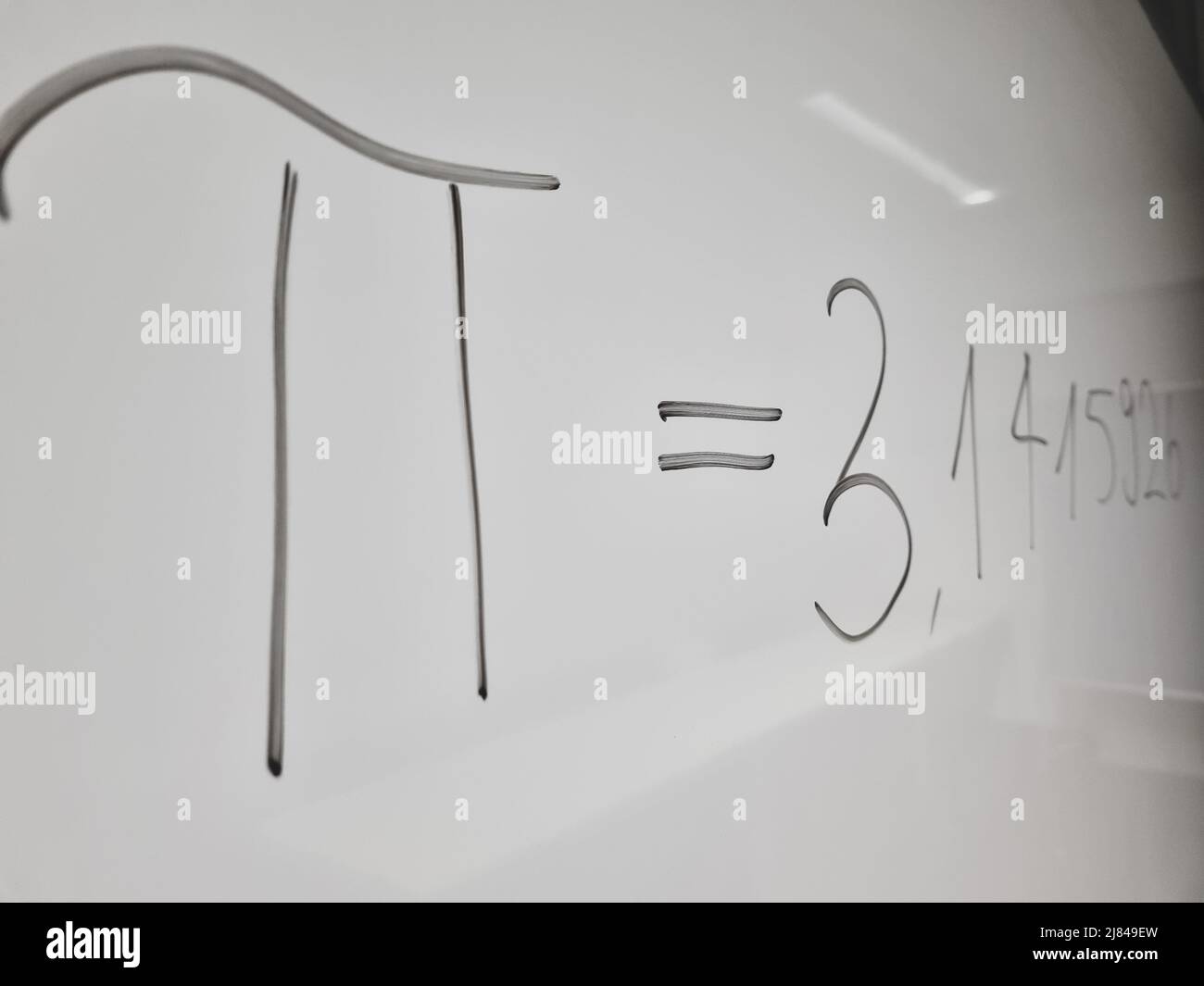 mathematical symbols of an equation from a mathematics lecture on a ...
