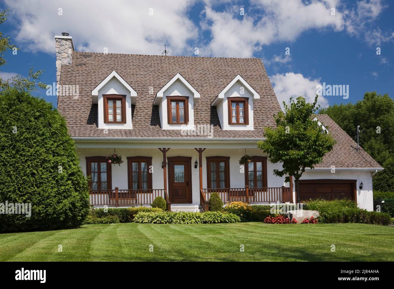 Replica of old 1860s Canadiana cottage style white stucco home with ...