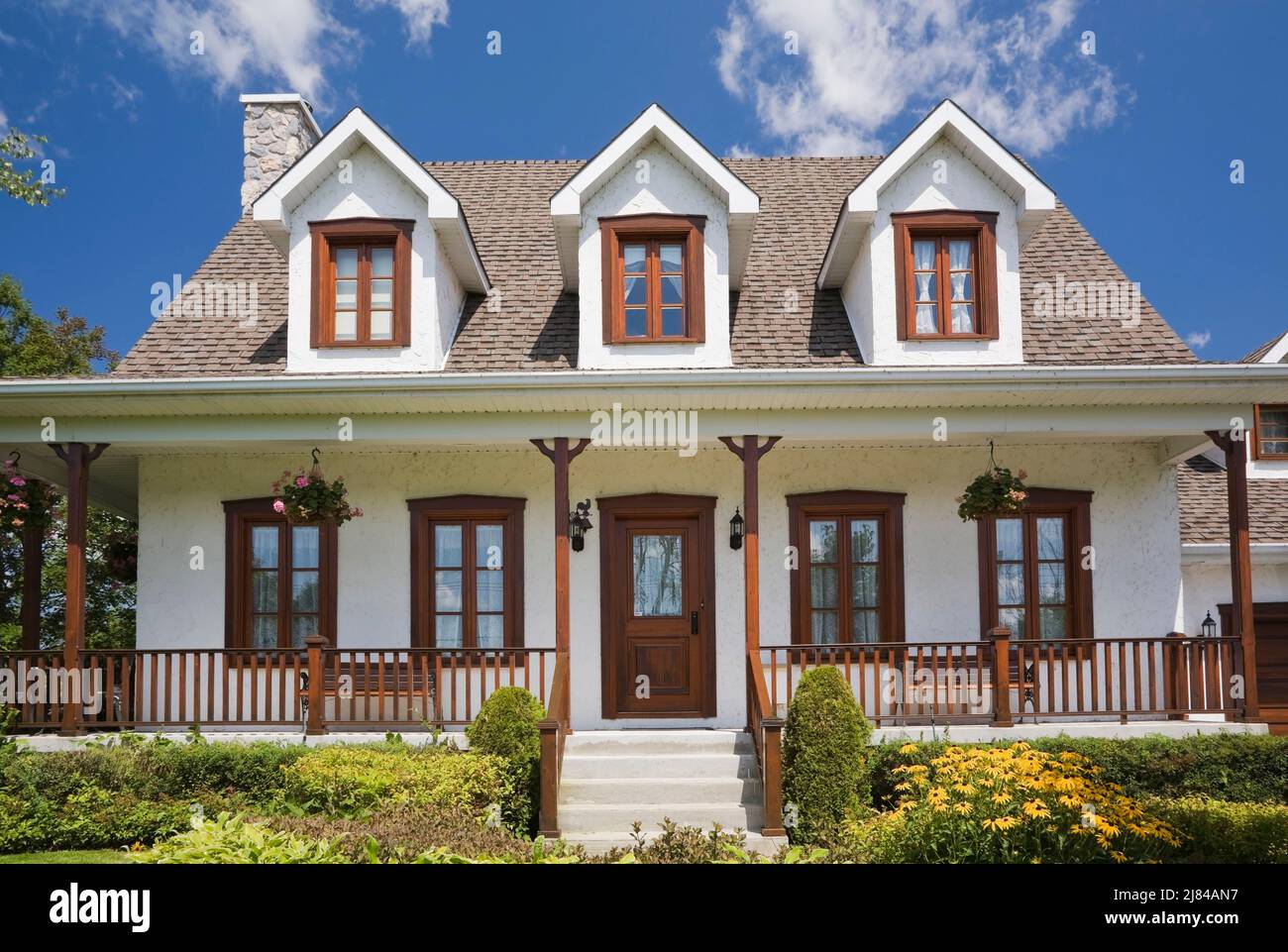 Replica of old 1860s Canadiana cottage style white stucco home with ...