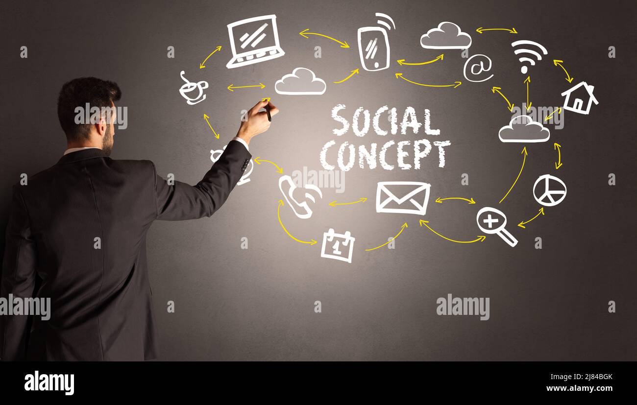 businessman drawing social media icons Stock Photo - Alamy