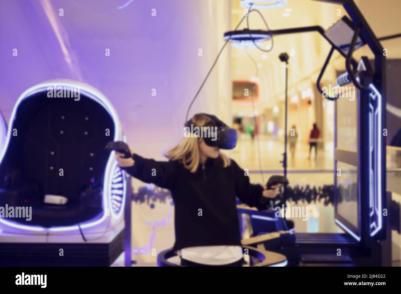 Game joystick girl plays joysticks hi-res stock photography and images ...