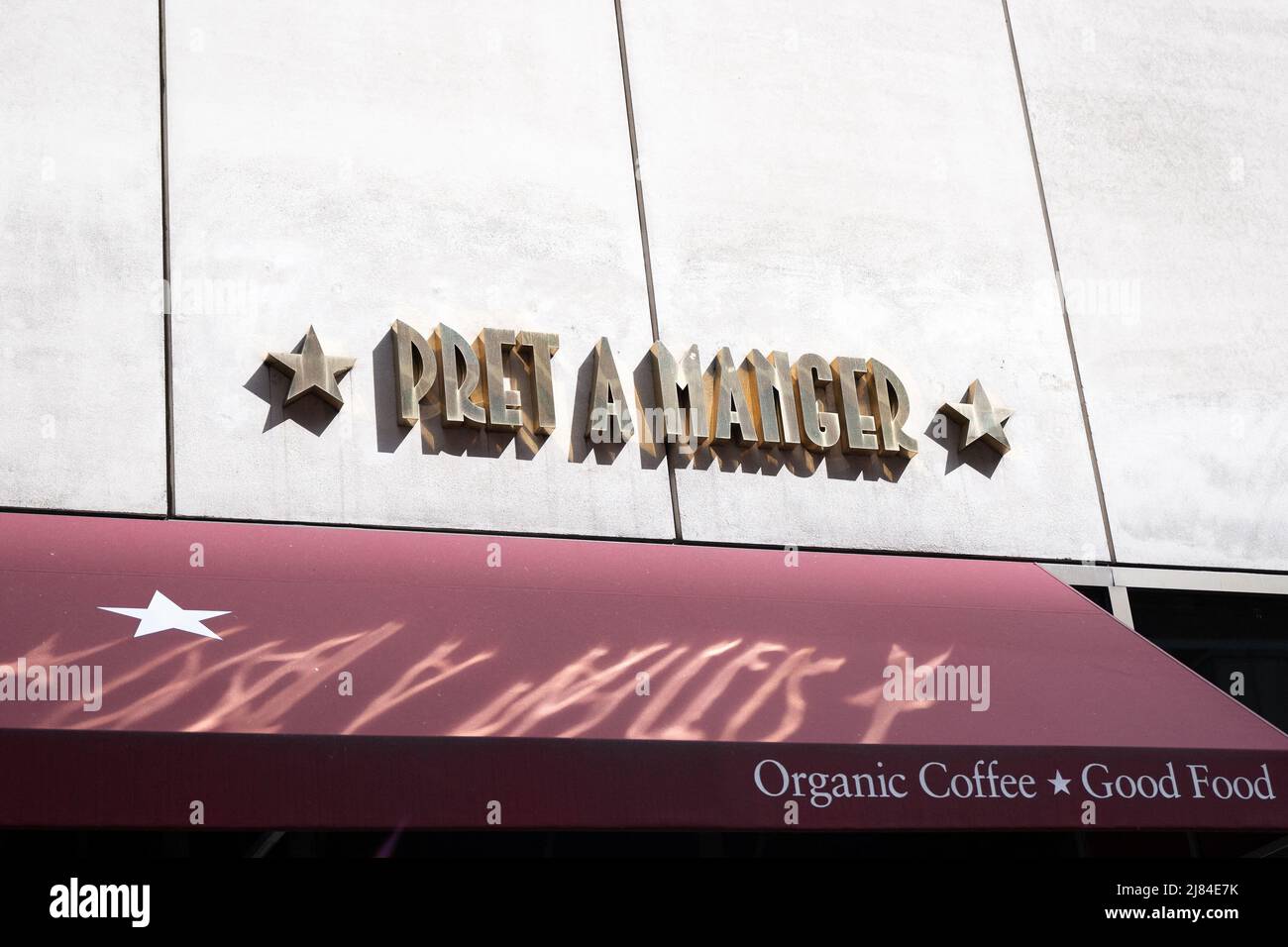 A shop sign of PRET A MANGER, on May 07, 2022 in New-York City, USA ...