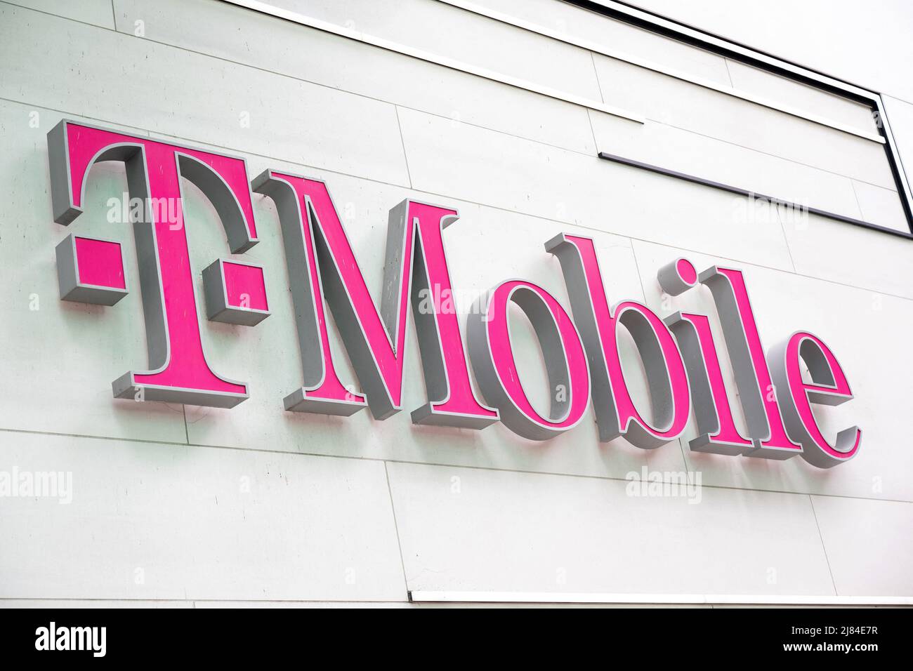 A shop sign of T MOBILE, on May 07, 2022 in New-York City, USA. Photo ...
