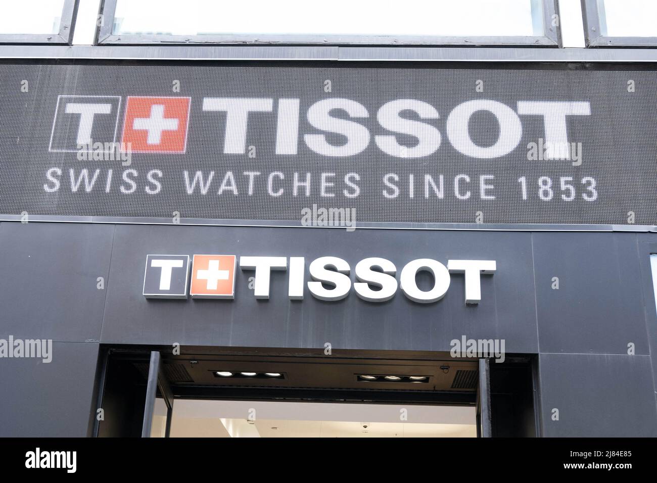 A shop sign of TISSOT, on May 07, 2022 in New-York City, USA. Photo by ...