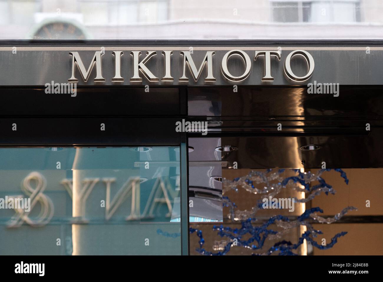 A shop sign of MIKIMOTO, on May 07, 2022 in New-York City, USA. Photo ...