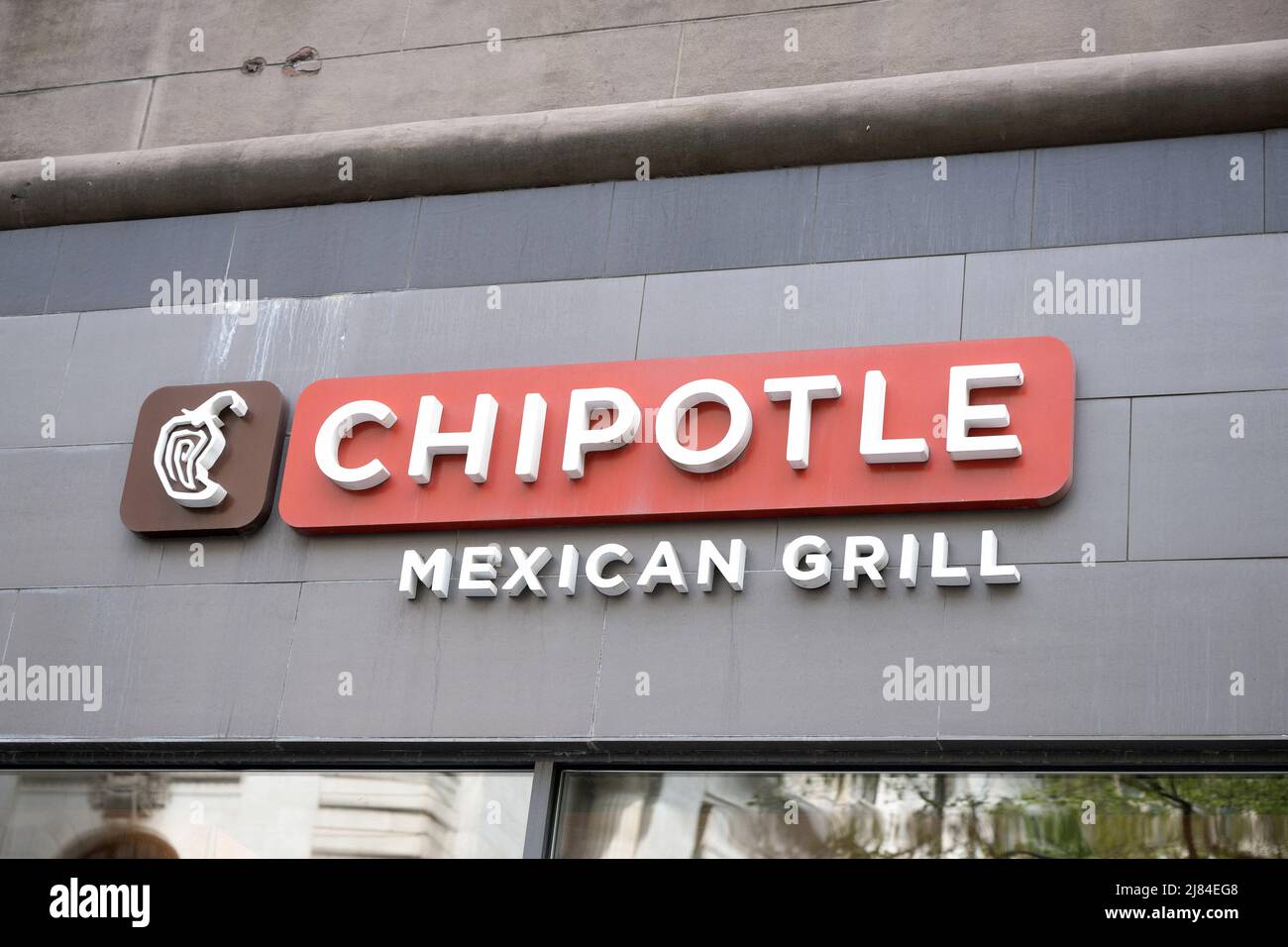 A shop sign of CHIPOTLE, on May 07, 2022 in New-York City, USA. Photo ...