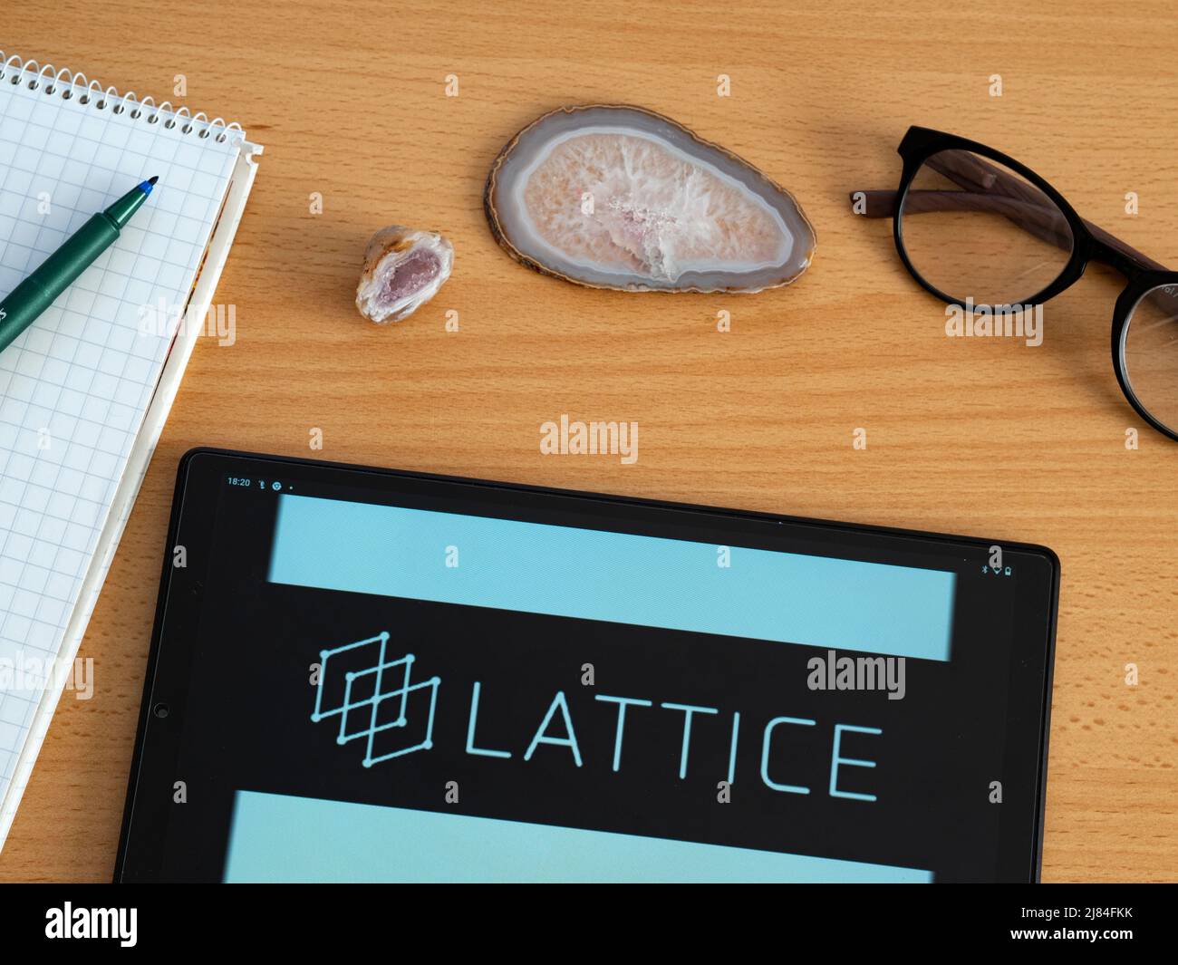 In this photo illustration Lattice Data, Inc. owned by Apple Inc. logo ...