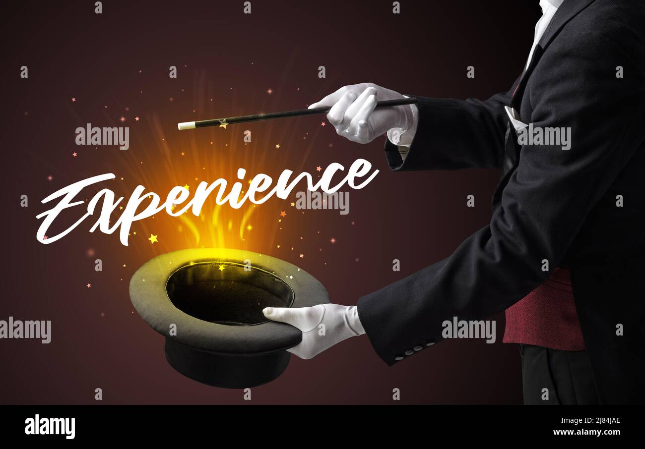 Old Magician is showing magic trick Stock Photo - Alamy