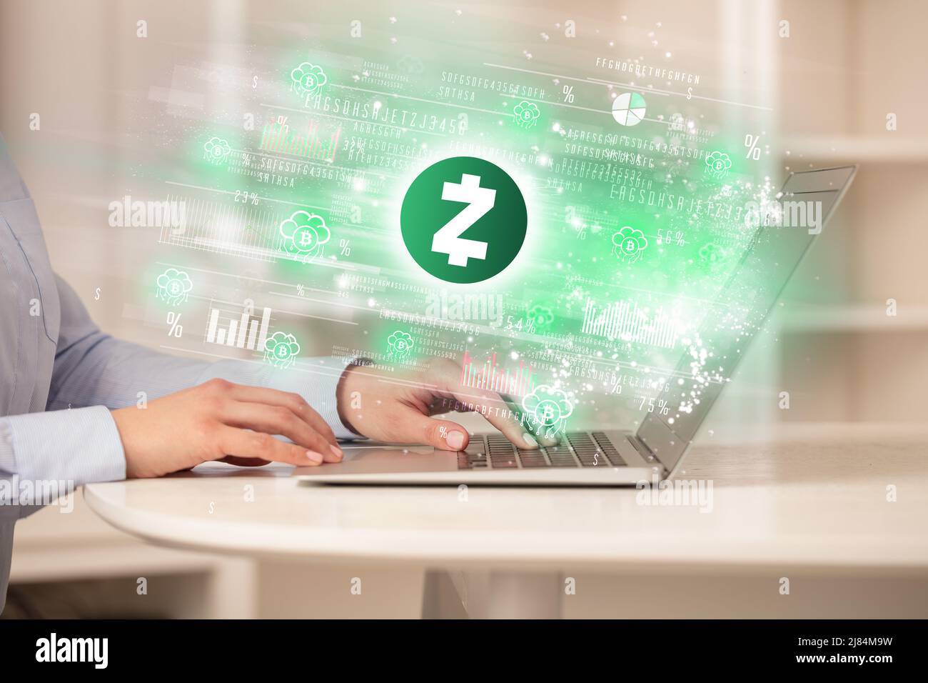Young man watching stock market on laptop Stock Photo - Alamy